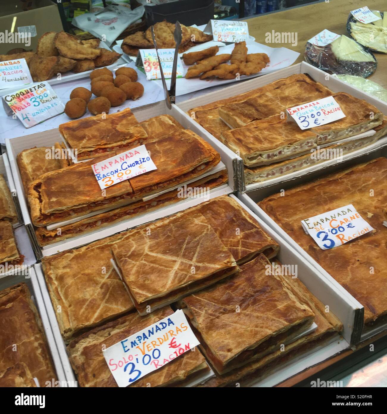 Empanadas on display at local market in Madrid Spain Stock Photo - Alamy