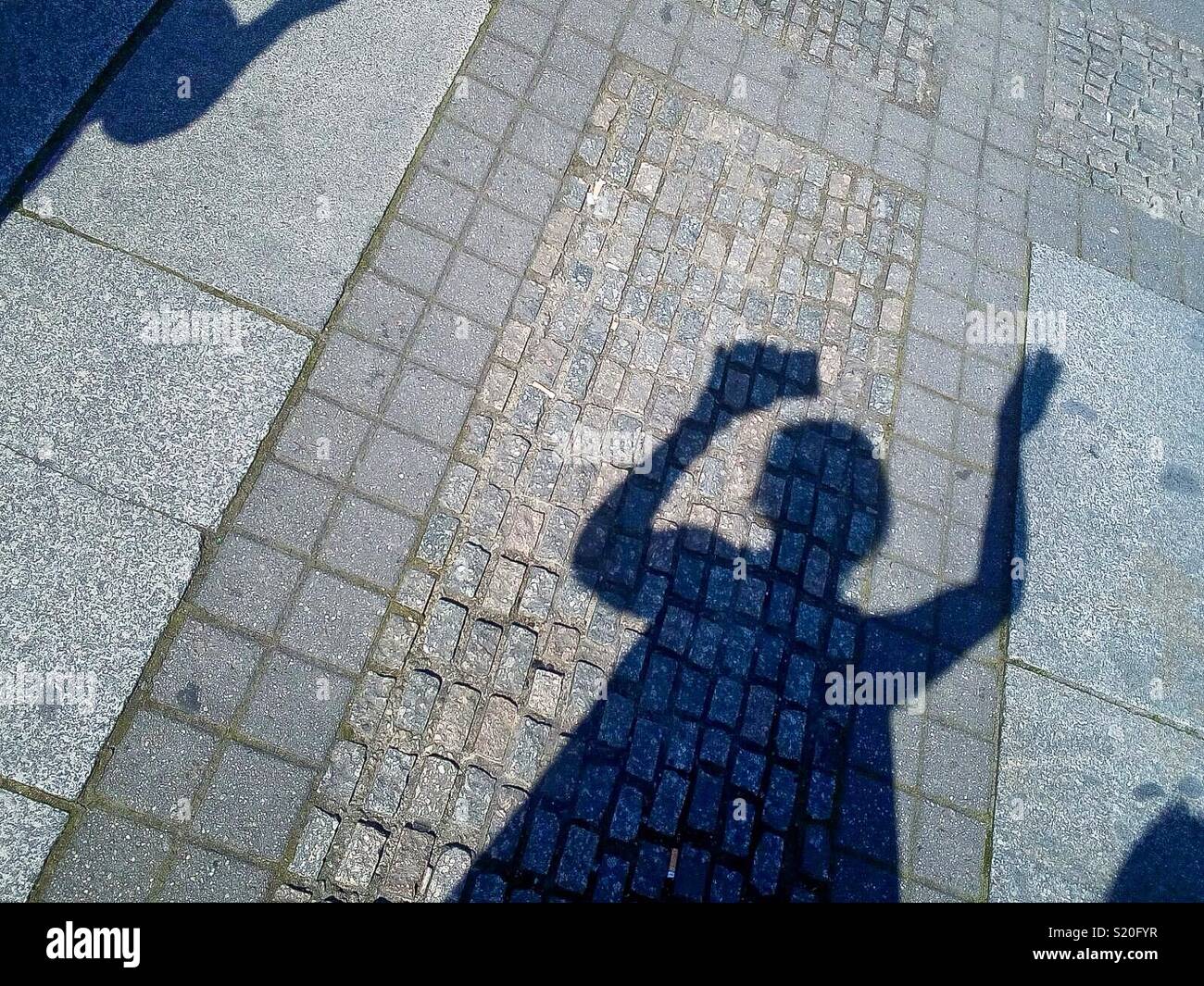 Shadow with mobile Stock Photo - Alamy