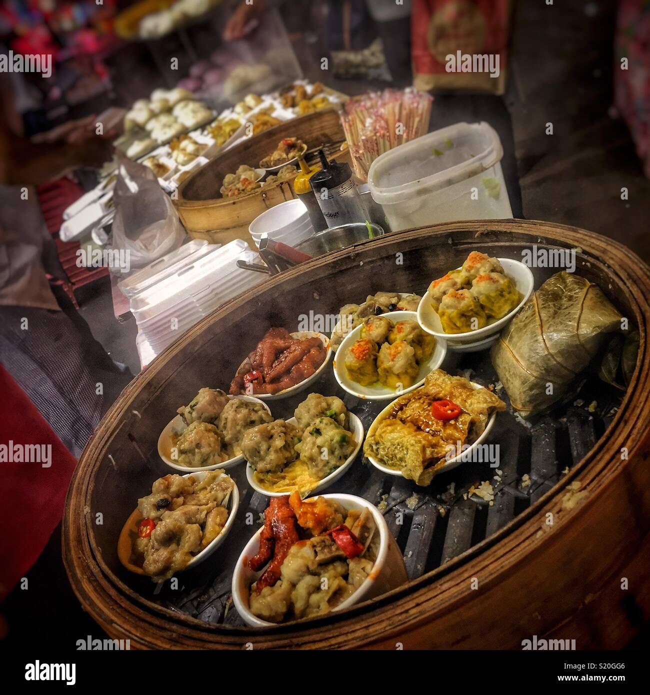 Traditional Cantonese steamed dim sum for sale in a street market in ...