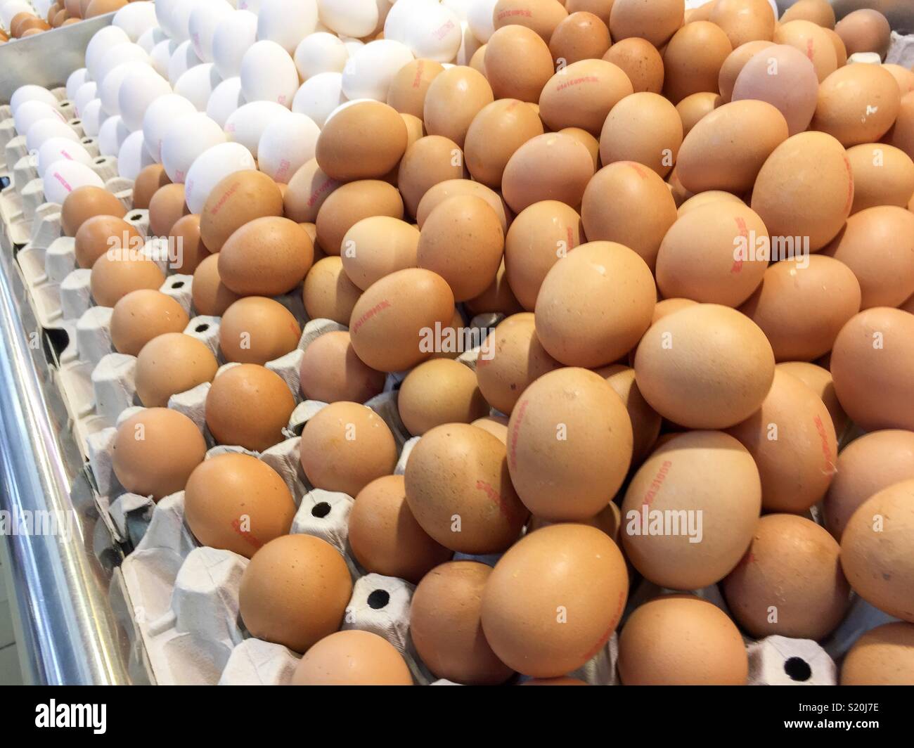 Some brown and white eggs in a shop Stock Photo - Alamy