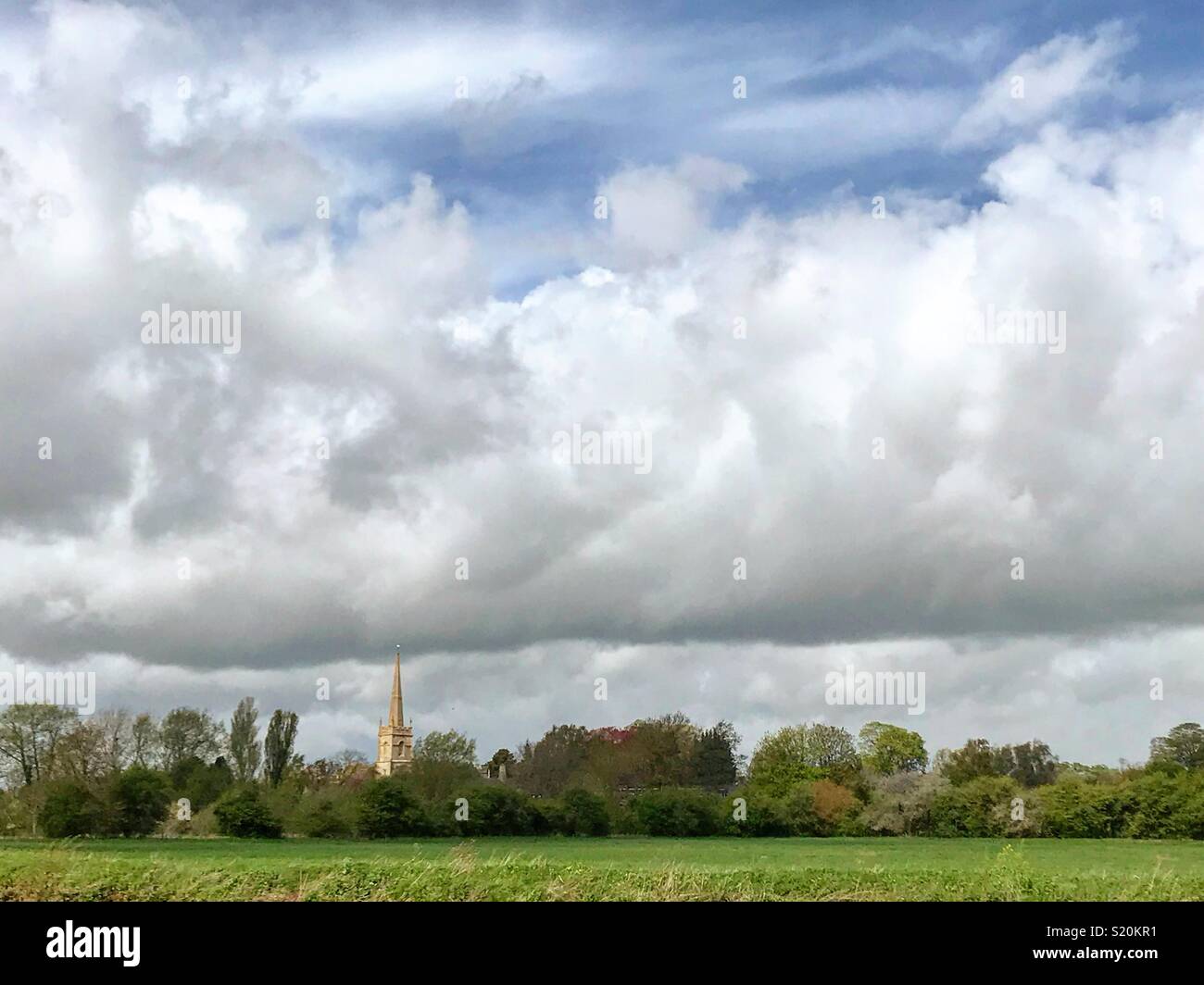 Lechlade church across the fields in the Cotswolds Stock Photo - Alamy