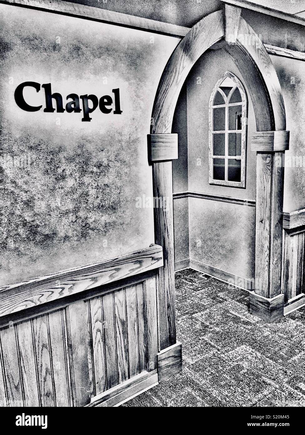 Hospital chapel with dramatic Gothic doorway Stock Photo - Alamy