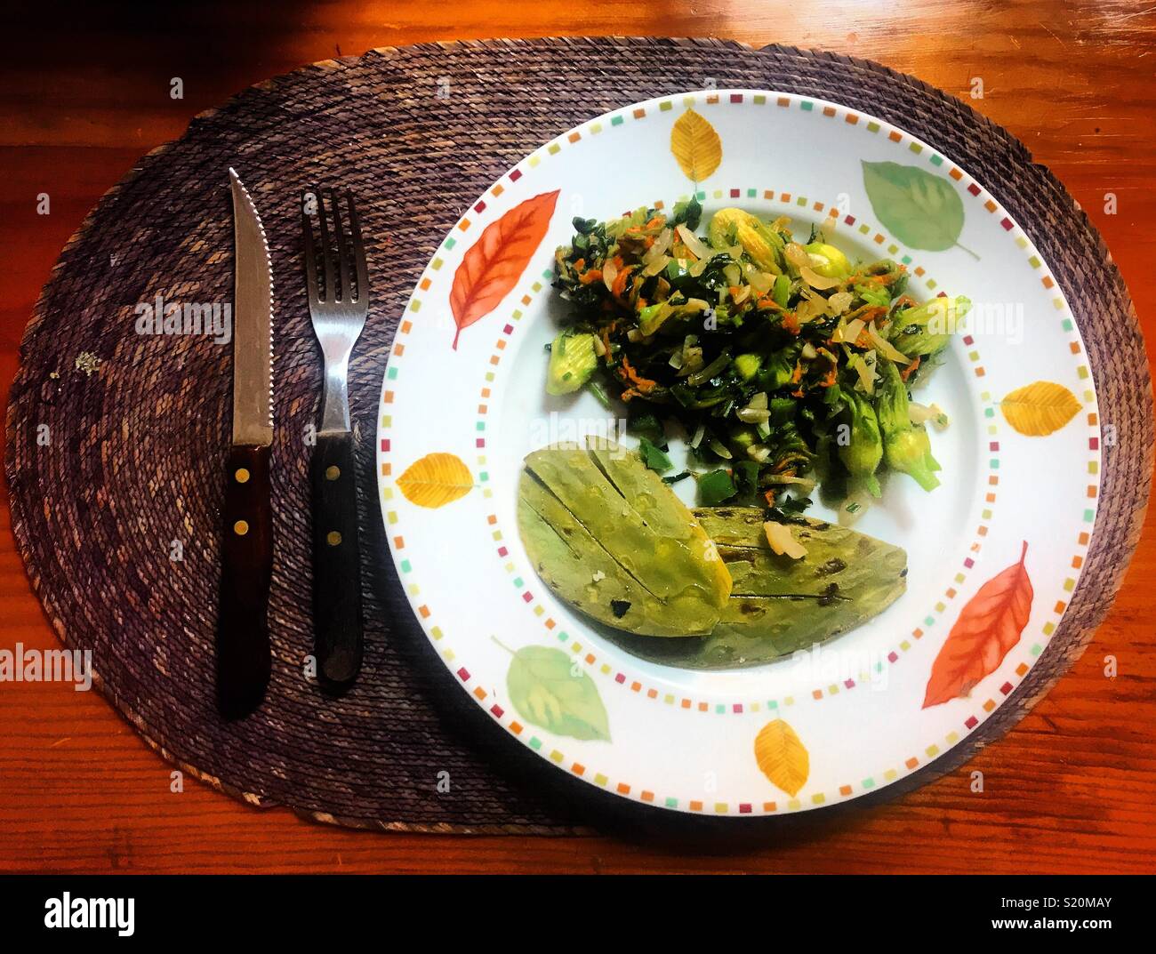 Roasted nopales and pumpkin flowers in a Mexican restaurant in Coyoacan ...