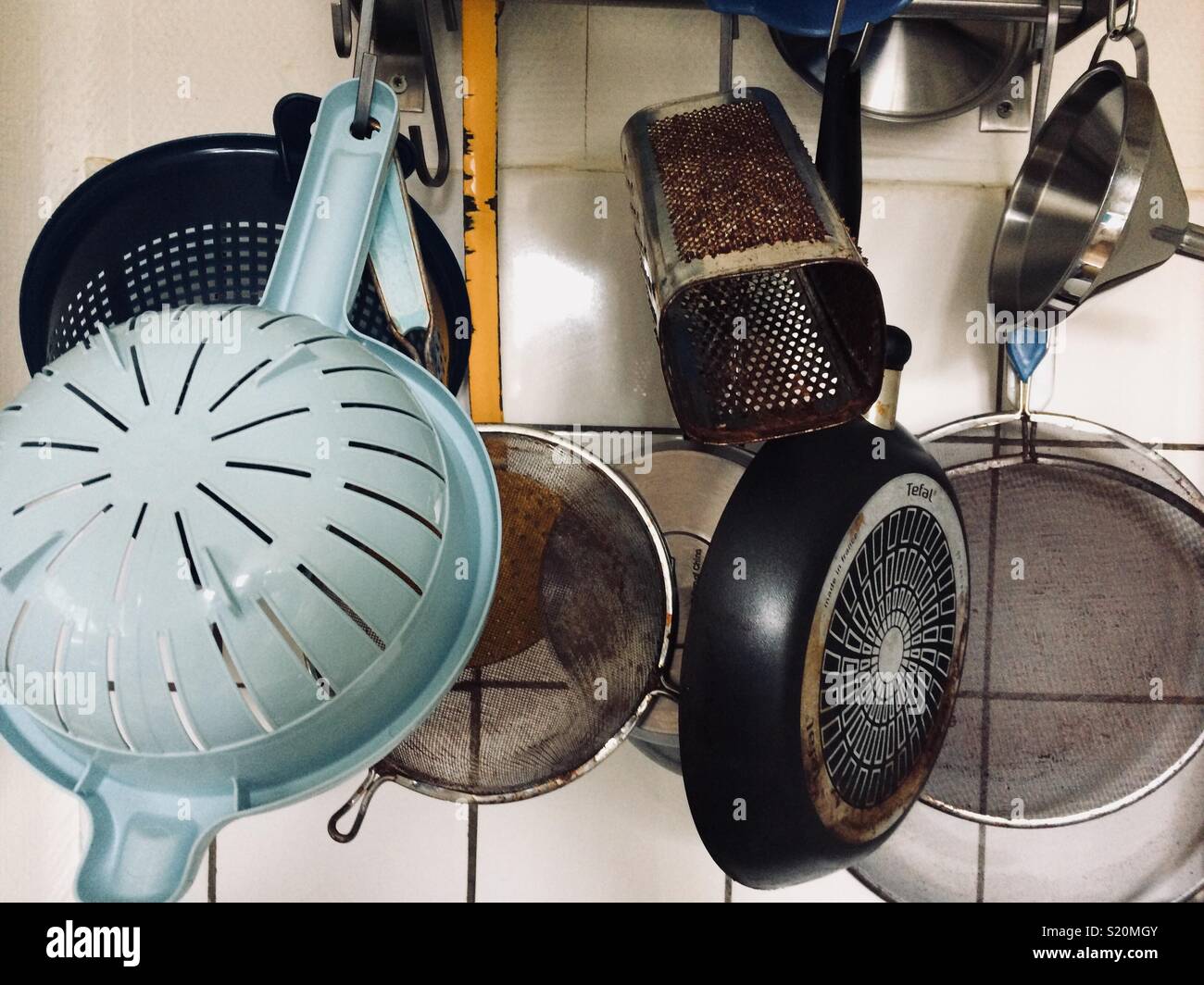 Hanging pans in kitchen hi-res stock photography and images - Alamy