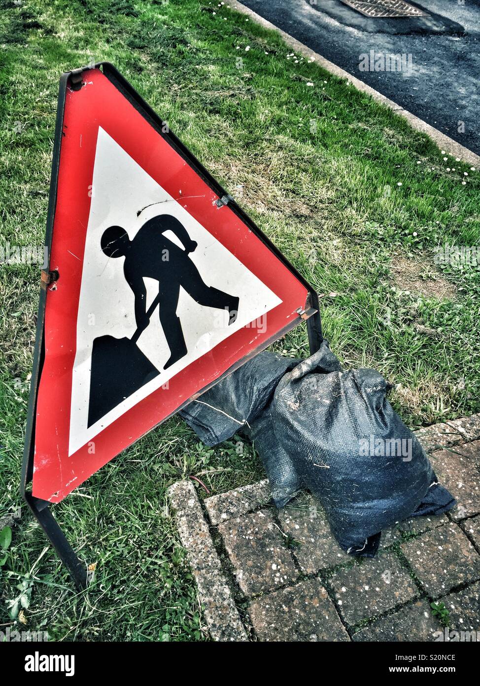 Workmen in the road, beware! Stock Photo - Alamy