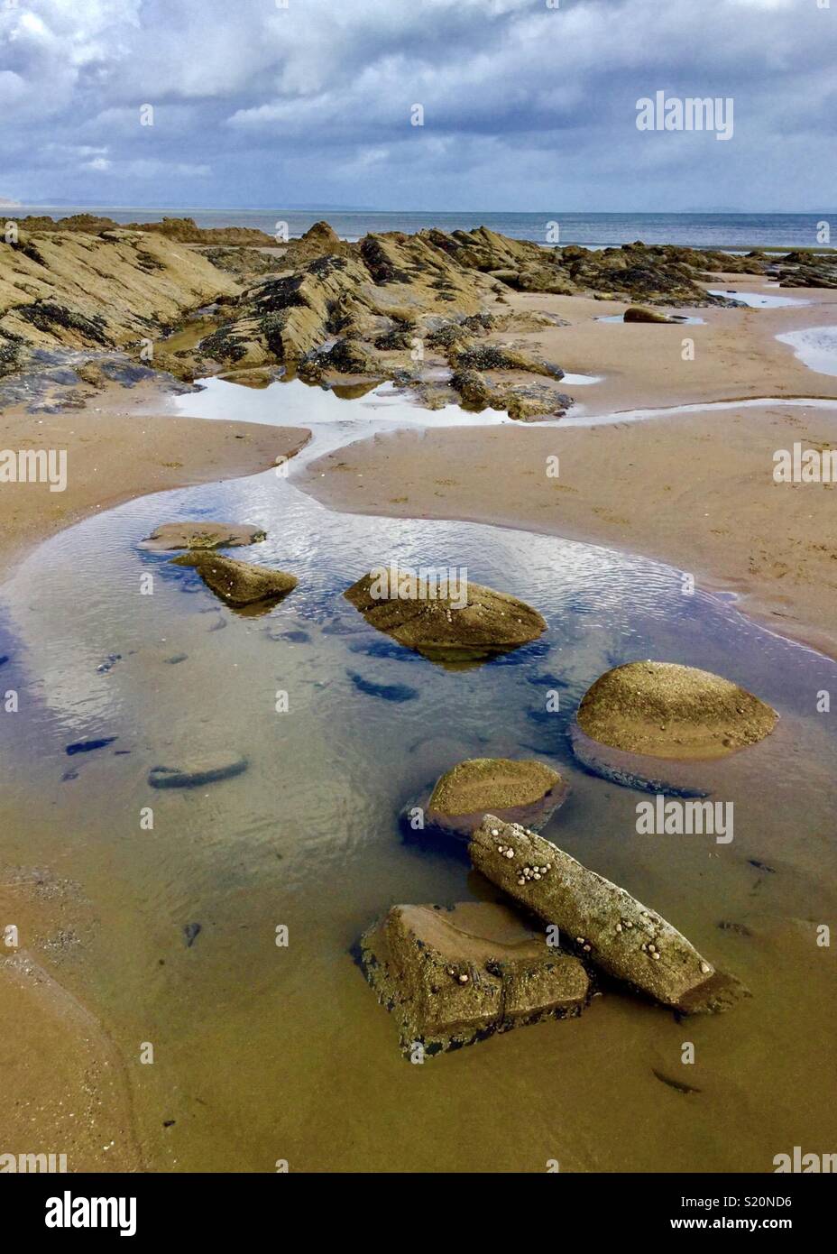 Rock Pools on Wisemans Bridge Beach at Low Tide Stock Photo - Alamy