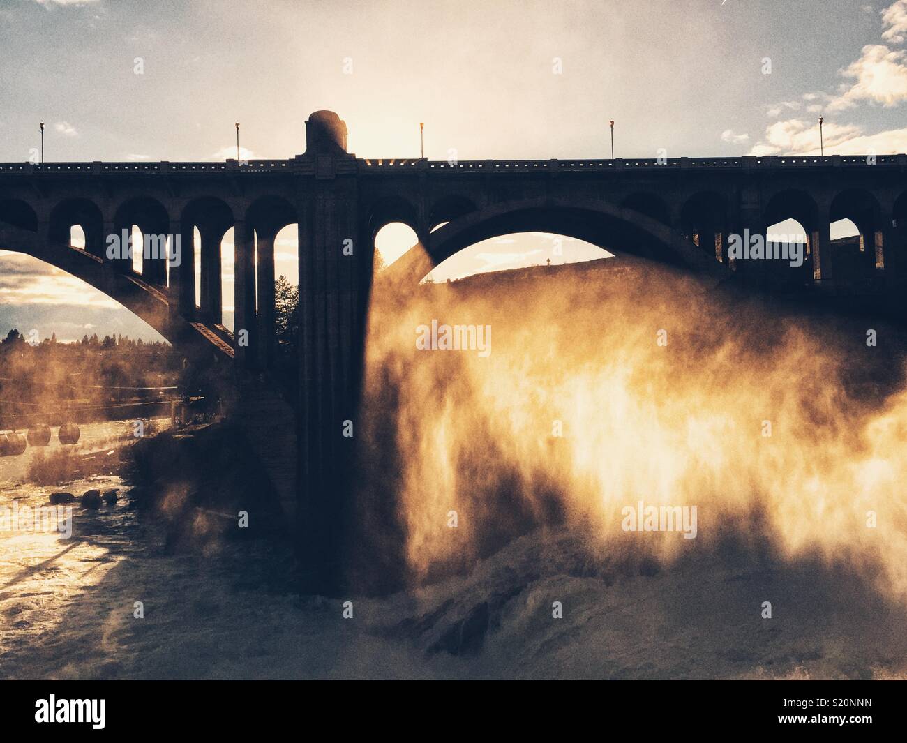 Famous Monroe Bridge over Spokane river at sunset Stock Photo - Alamy