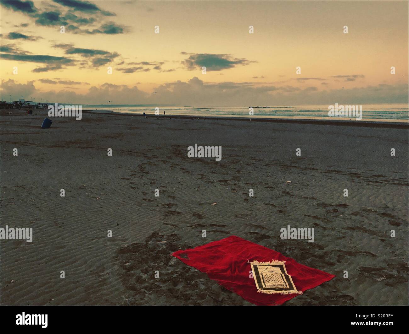 Prayer on the beach Stock Photo - Alamy