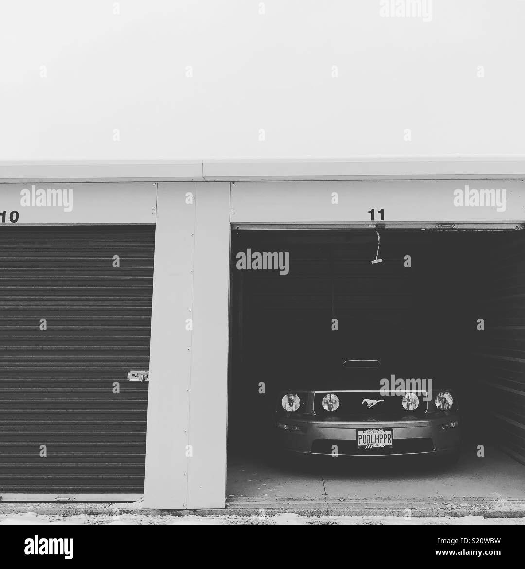 Hiding car Black and White Stock Photos & Images - Alamy