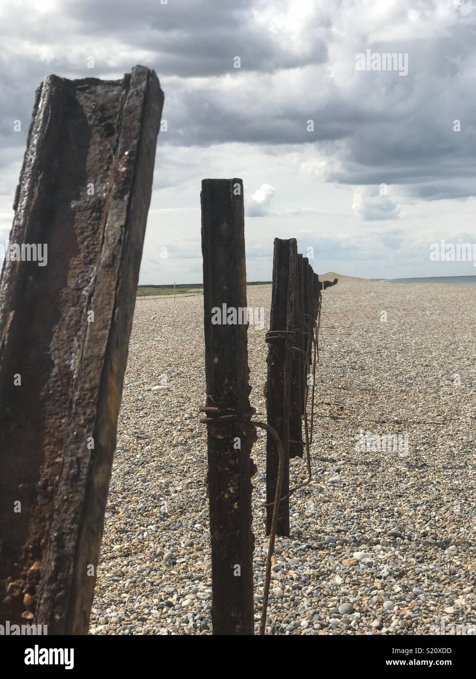 Wood groins and shingle beach hi-res stock photography and images - Alamy