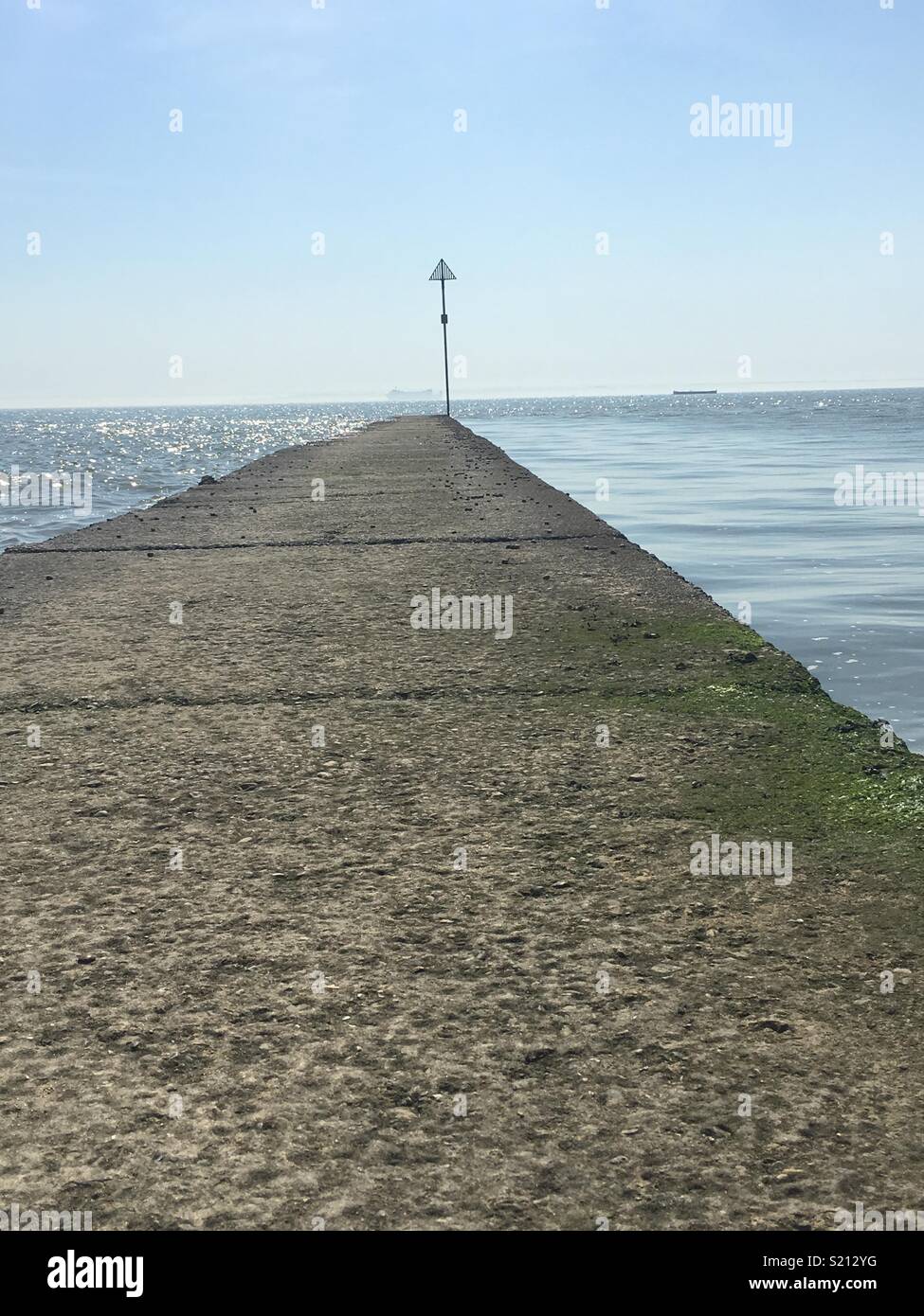 The jetty in the sea Stock Photo - Alamy