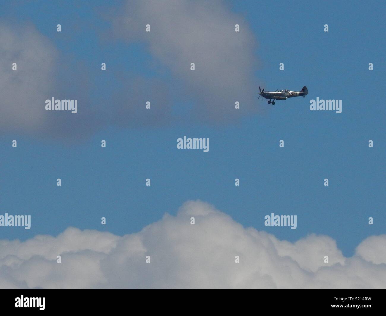 Spitfire in the sky Stock Photo - Alamy