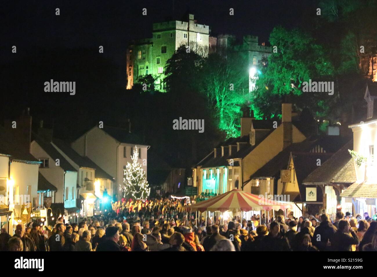 Dunster High Street, Dunster by Candlelight Stock Photo - Alamy