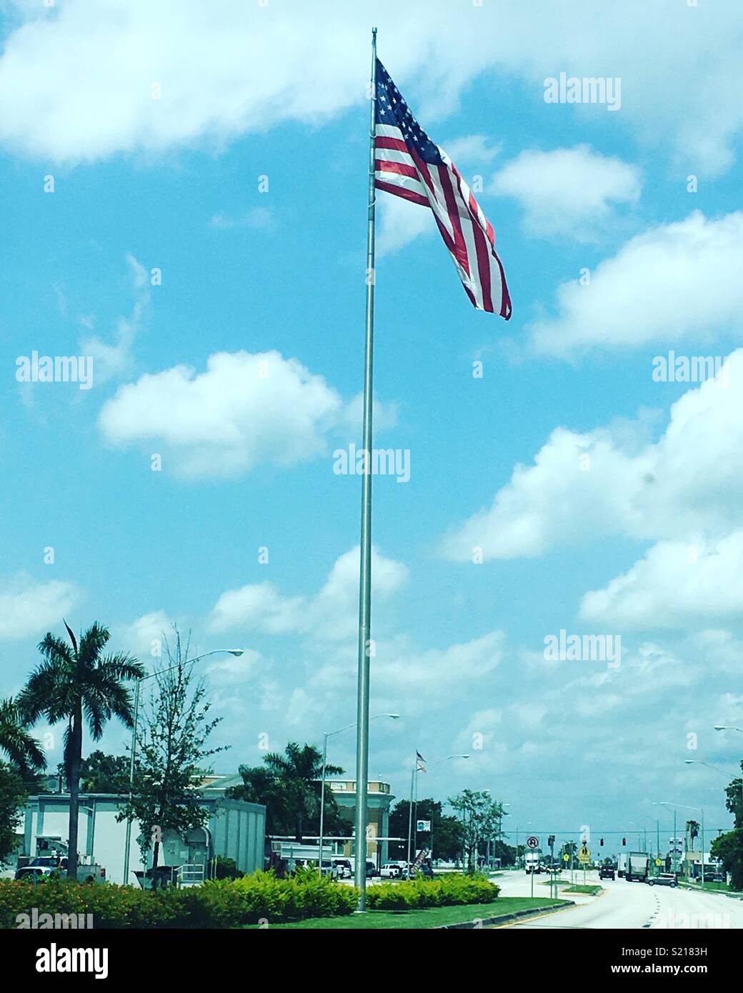 Usa flag miami on highway Stock Photo - Alamy