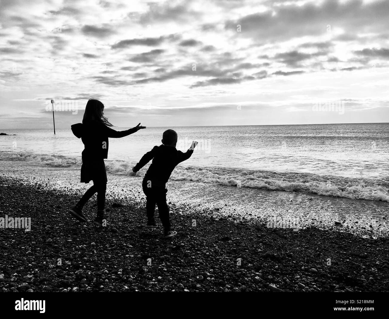 Children throwing stones Black and White Stock Photos & Images - Alamy