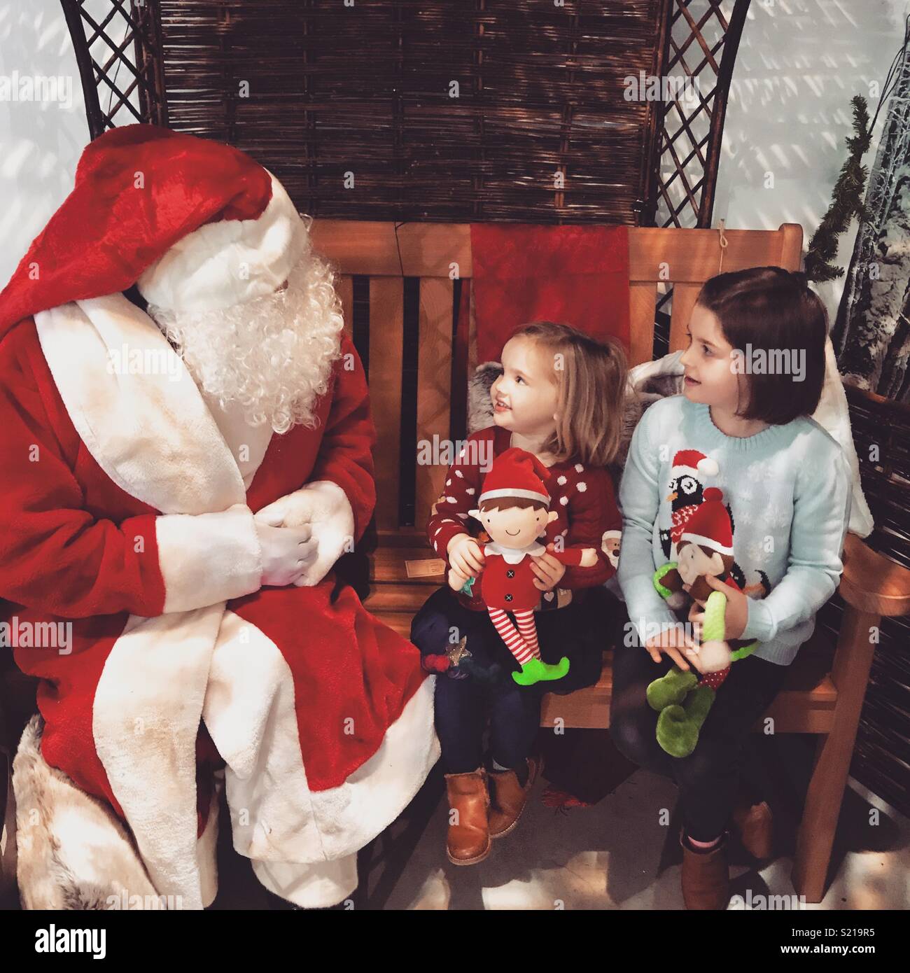 Two children talking hi-res stock photography and images - Alamy