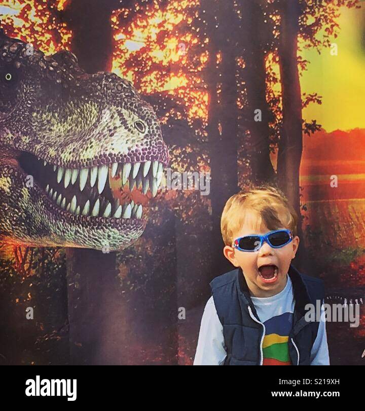 T-Rex scaring child Stock Photo - Alamy