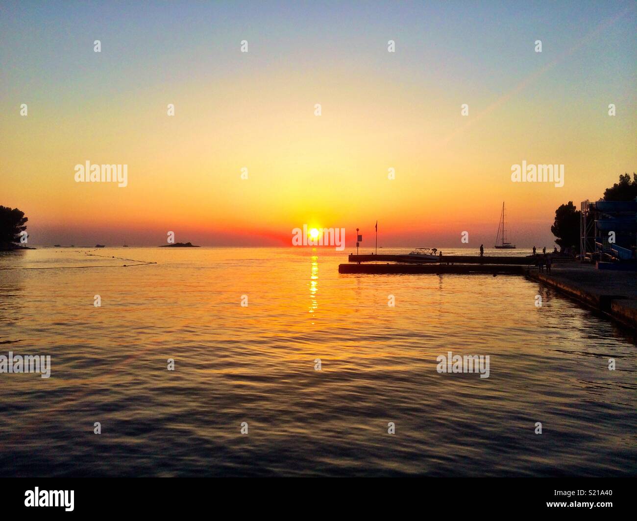 Croatian sunset in Porec Stock Photo - Alamy
