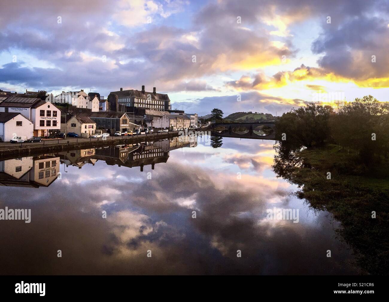 Reflections on the river Tywi in Carmarthen West Wales Stock Photo - Alamy