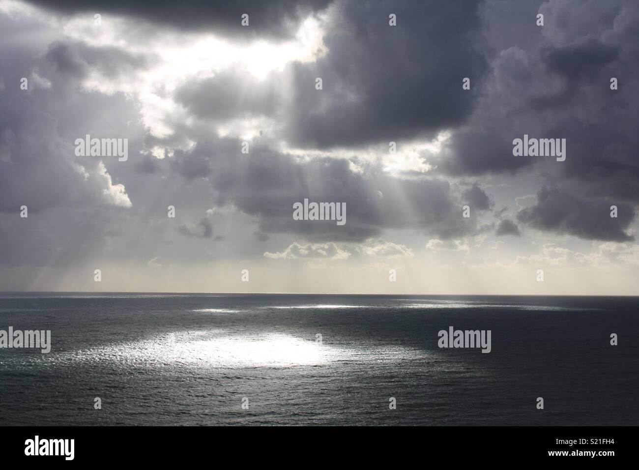 Cloudy by the sea Stock Photo - Alamy