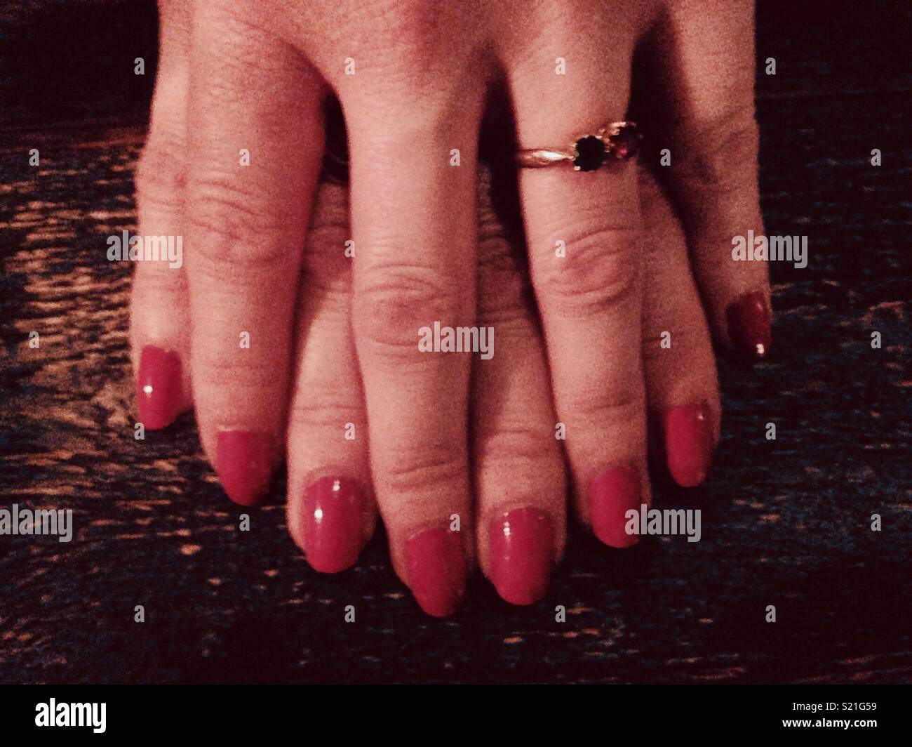 Red finger nails hi-res stock photography and images - Alamy