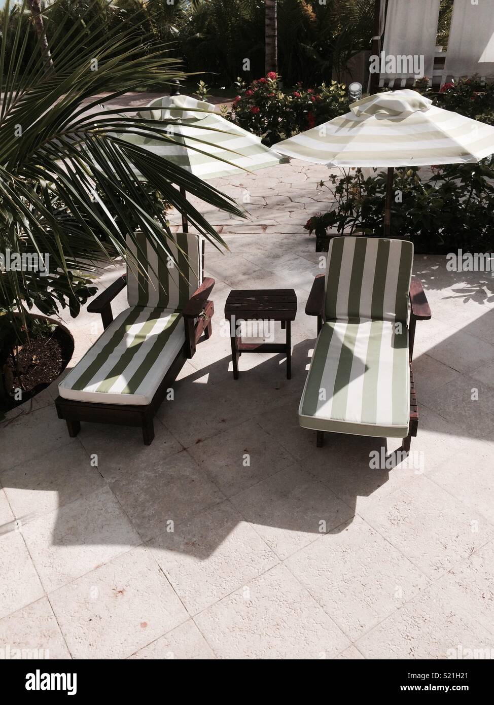 Kids mini sunbeds, Mexico Stock Photo - Alamy