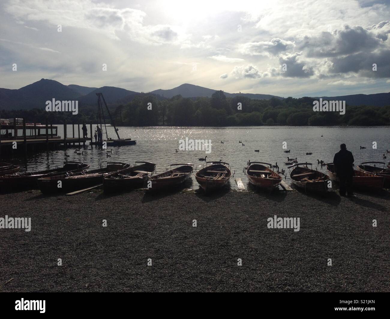 Boats overlooking Derwent Water Stock Photo - Alamy
