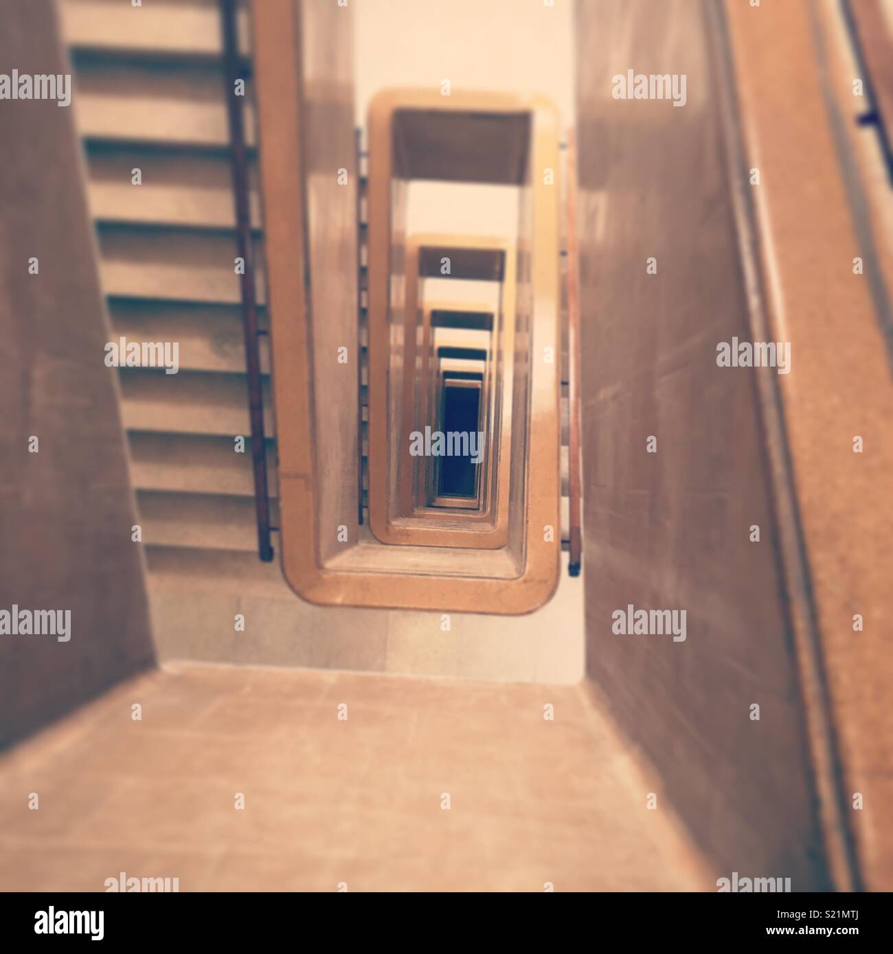 Deep stair well Stock Photo - Alamy