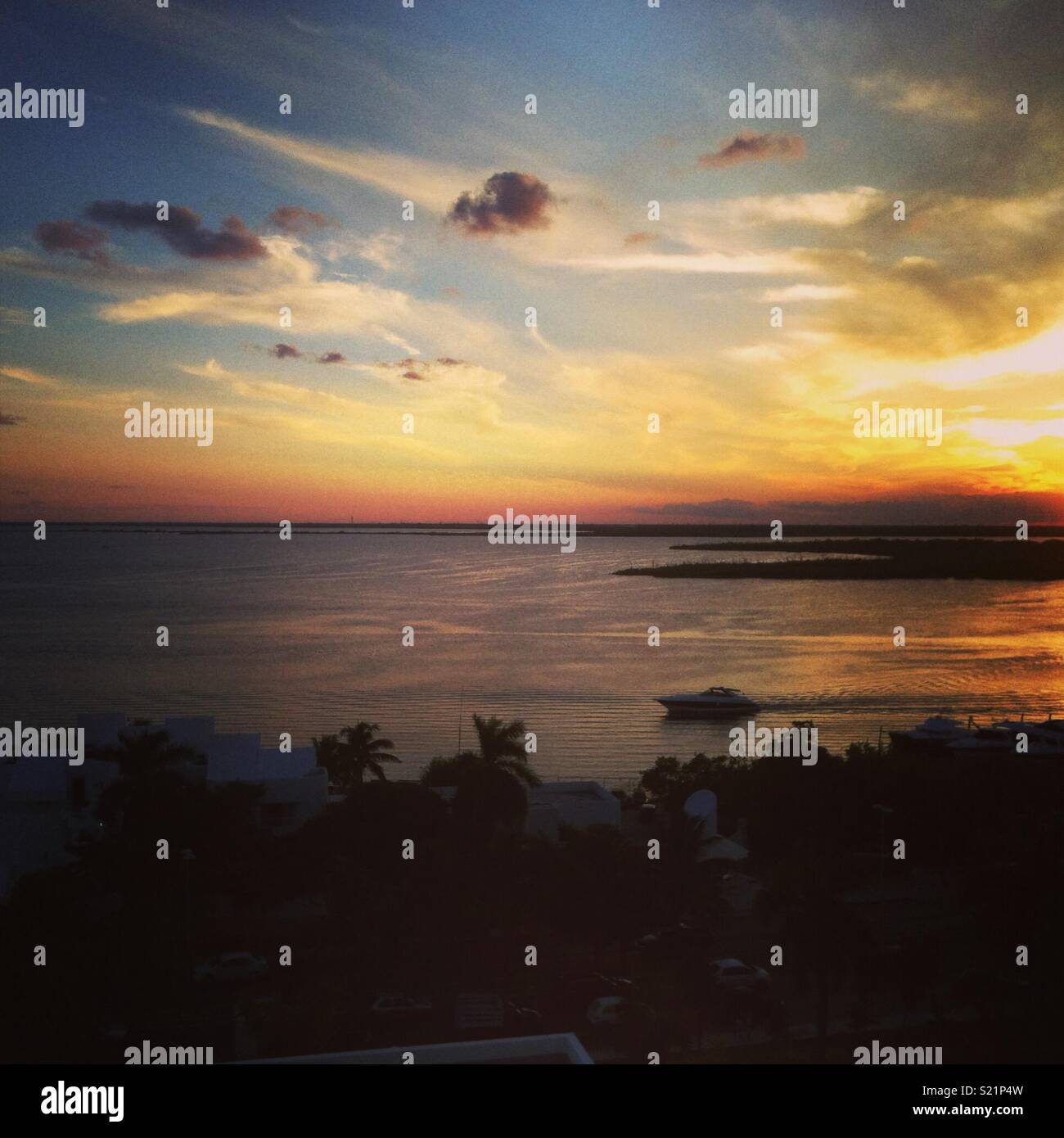 Sunset from the 4th floor of the Riu Caribe, Cancun Stock Photo - Alamy