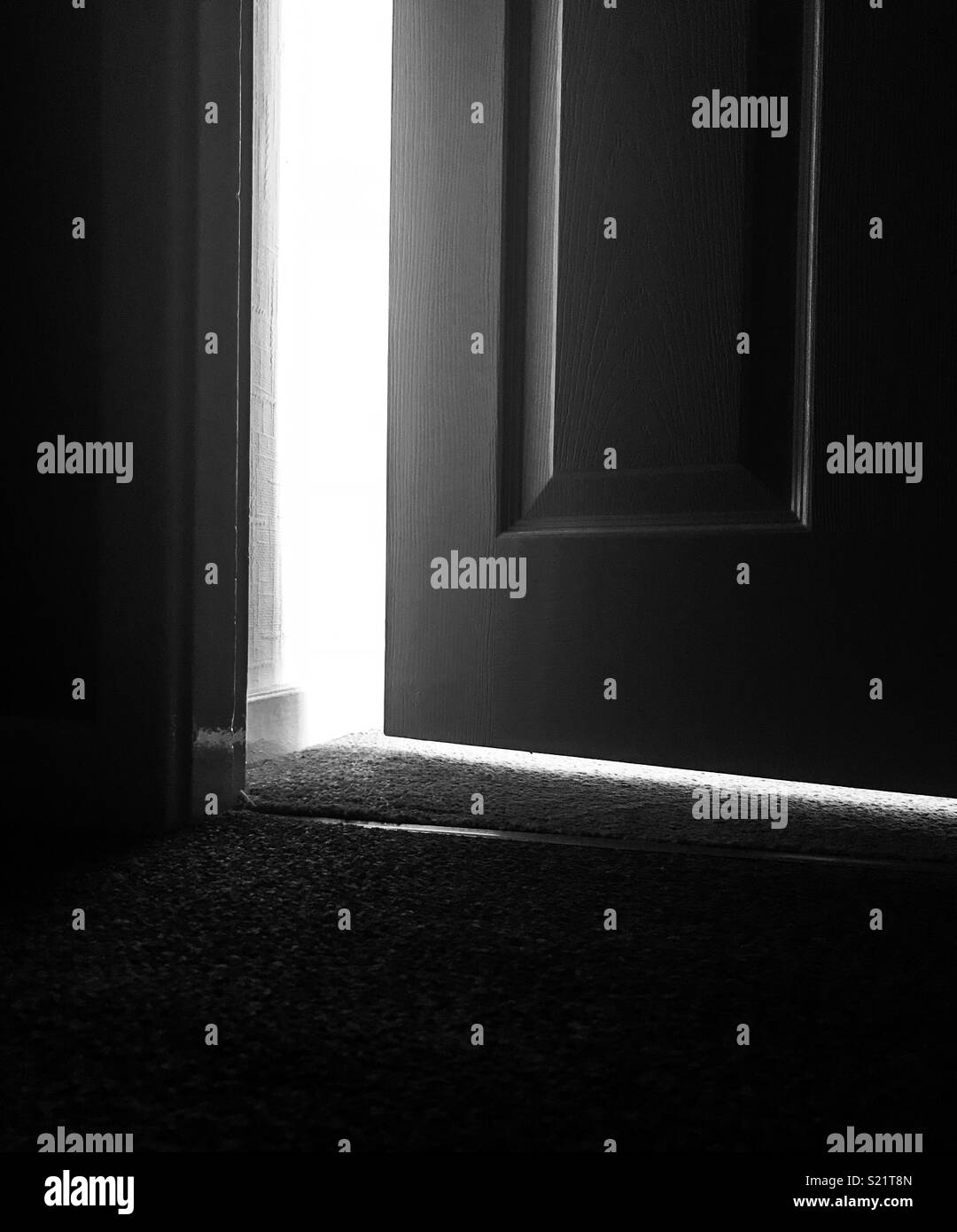 Light shines under door hi-res stock photography and images - Alamy