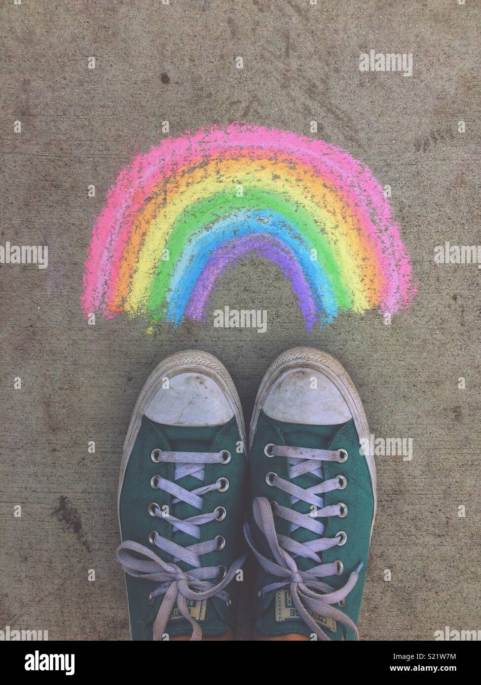 Chalk rainbow on sidewalk Stock Photo - Alamy