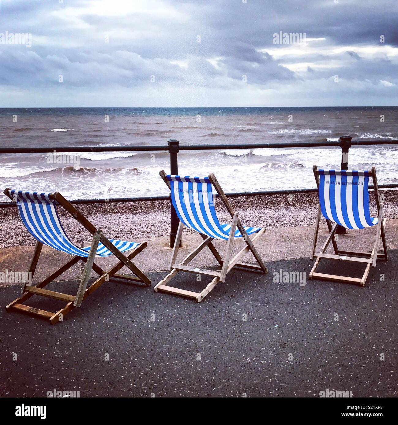 Empty deck chairs hi-res stock photography and images - Alamy