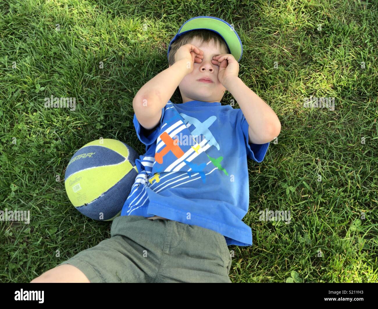 Tired boy hi-res stock photography and images - Alamy