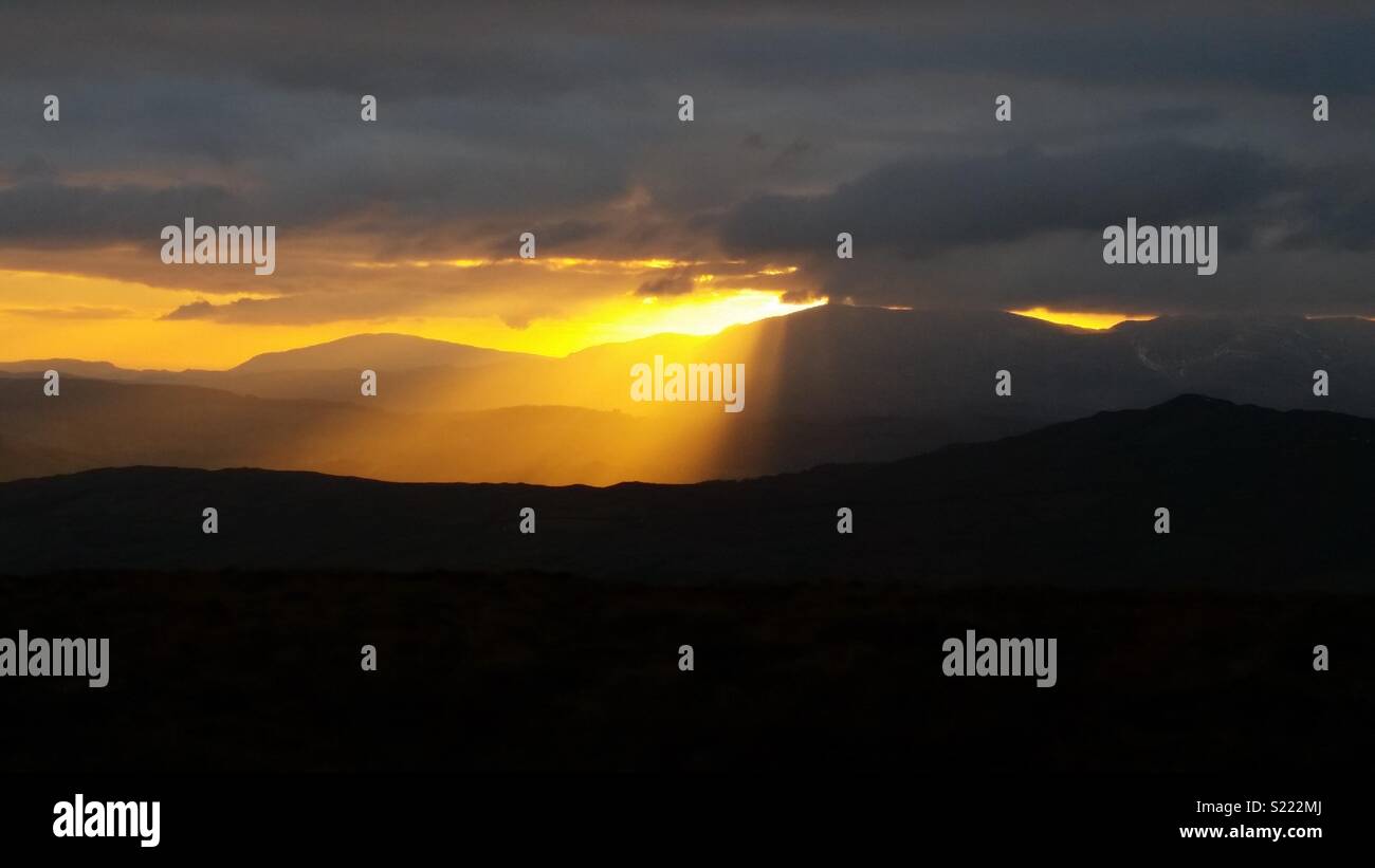 Sun beams clouds hi-res stock photography and images - Alamy