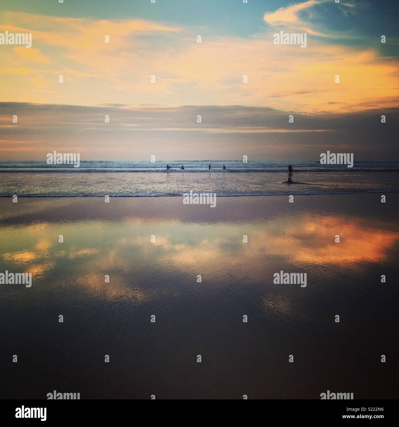 Golden sunset view on beach in Cornwall Stock Photo - Alamy