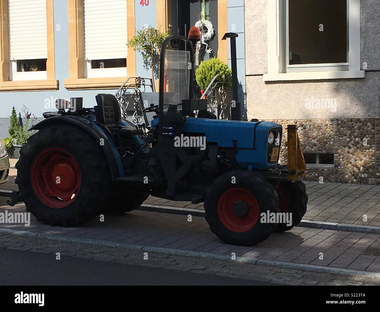 Blue tractor hi-res stock photography and images - Alamy