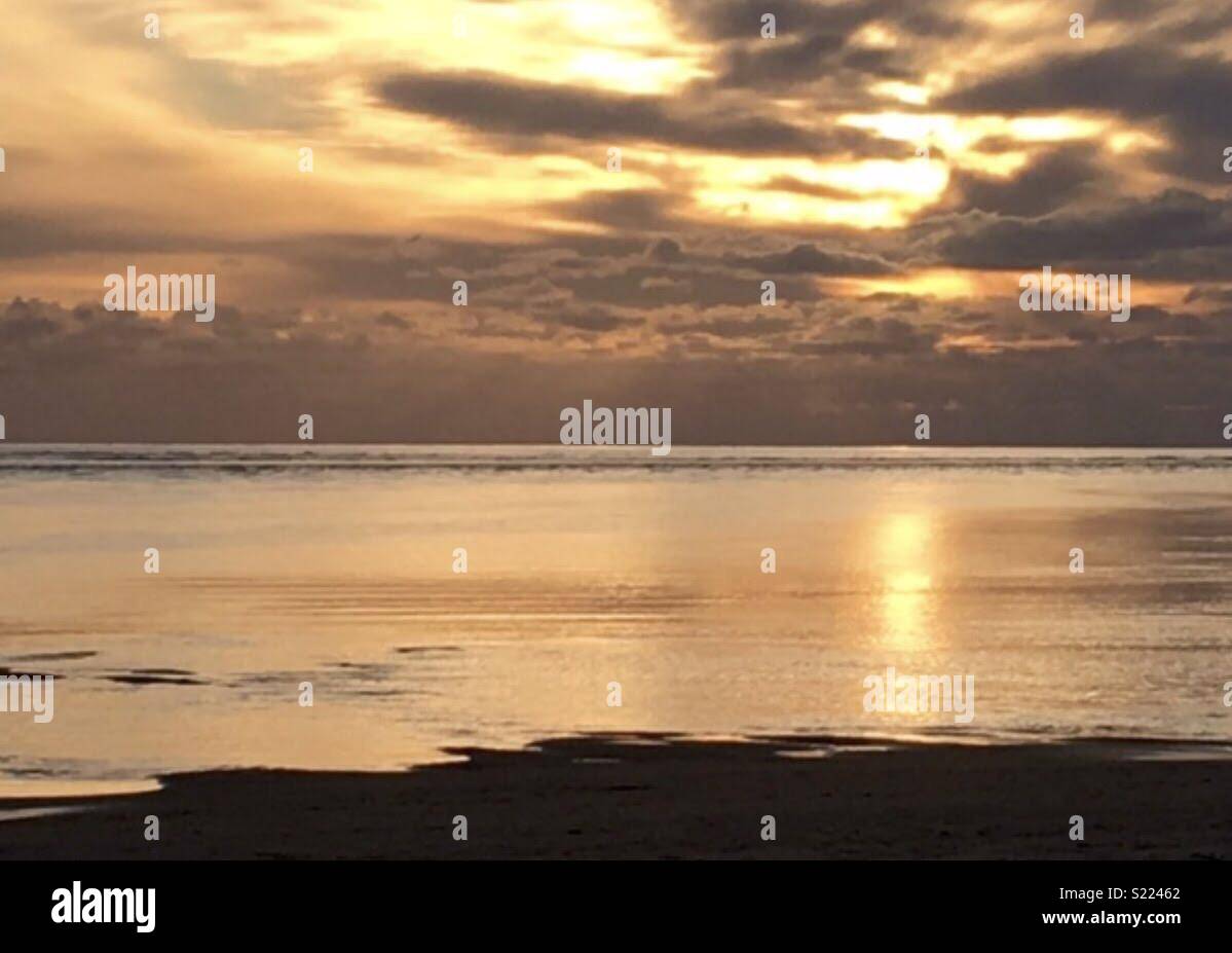 Simple sea and sunset Stock Photo - Alamy
