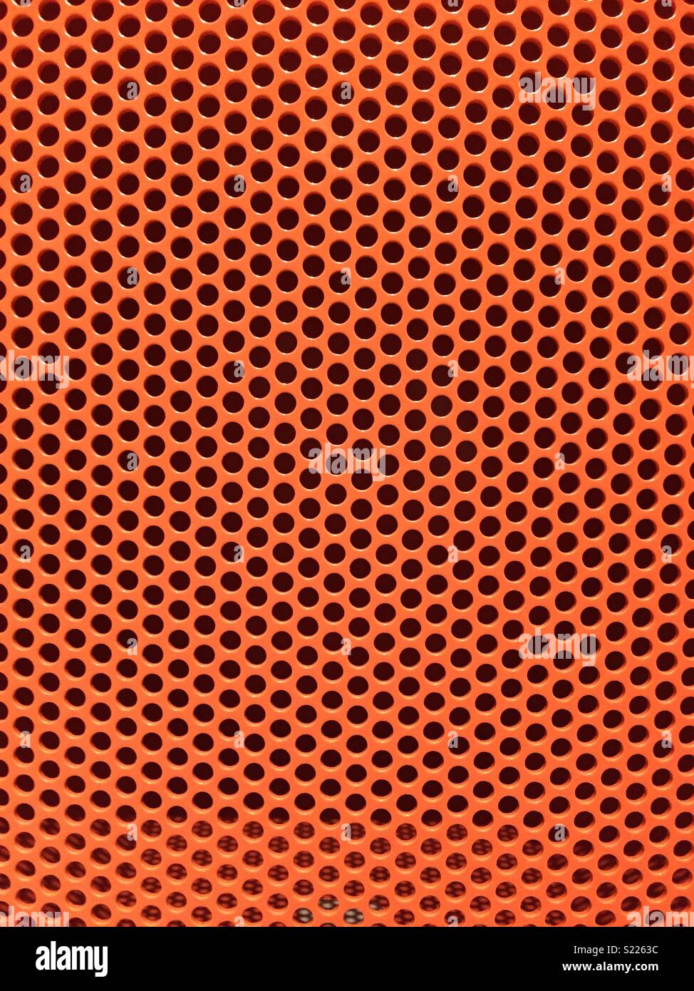 Orange circular mesh Stock Photo - Alamy