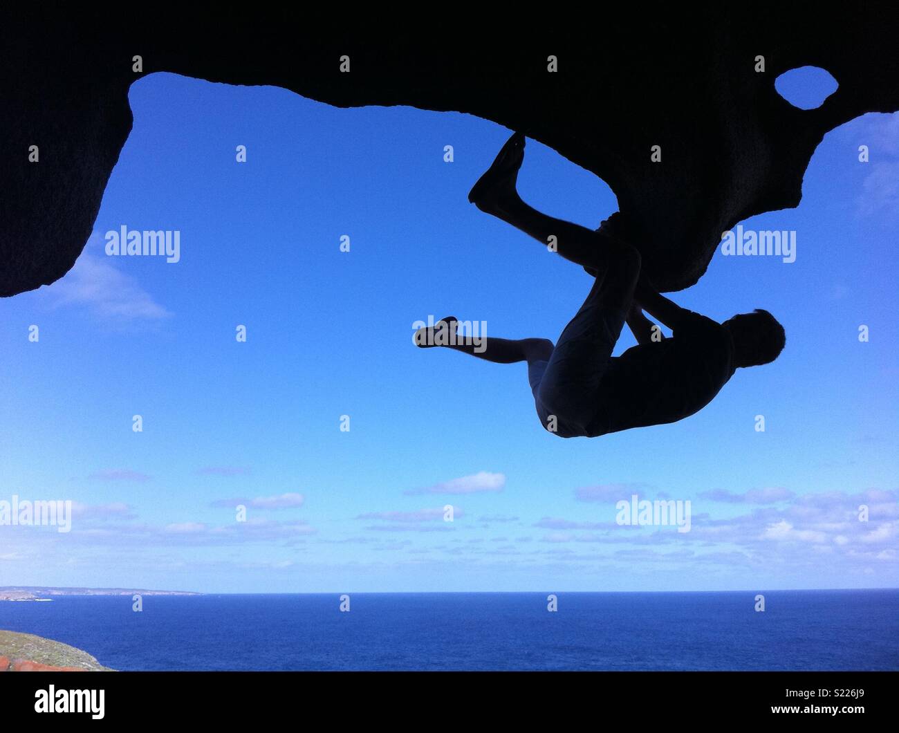 Rock climbing silhouette Stock Photo - Alamy