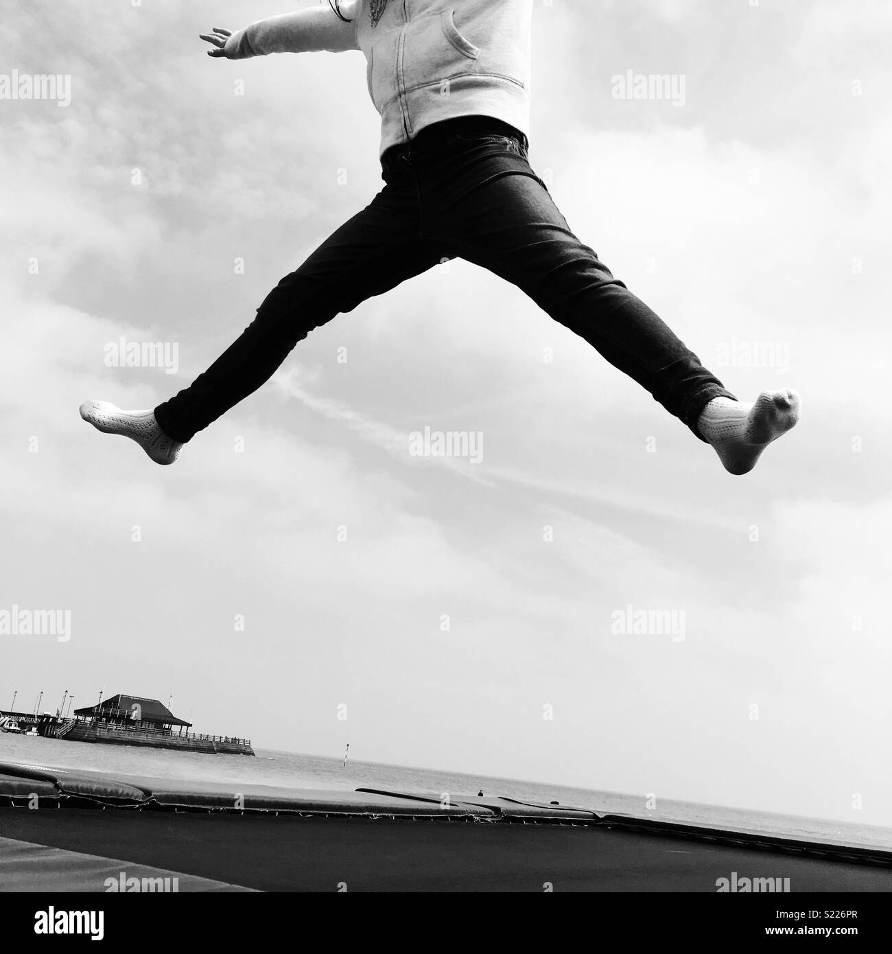 Trampoline jump Black and White Stock Photos & Images - Alamy