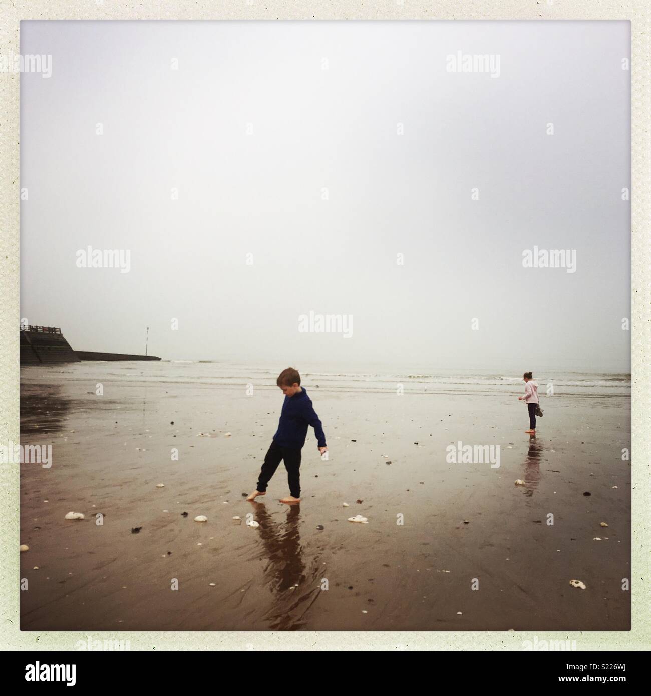 Collecting shells hi-res stock photography and images - Alamy