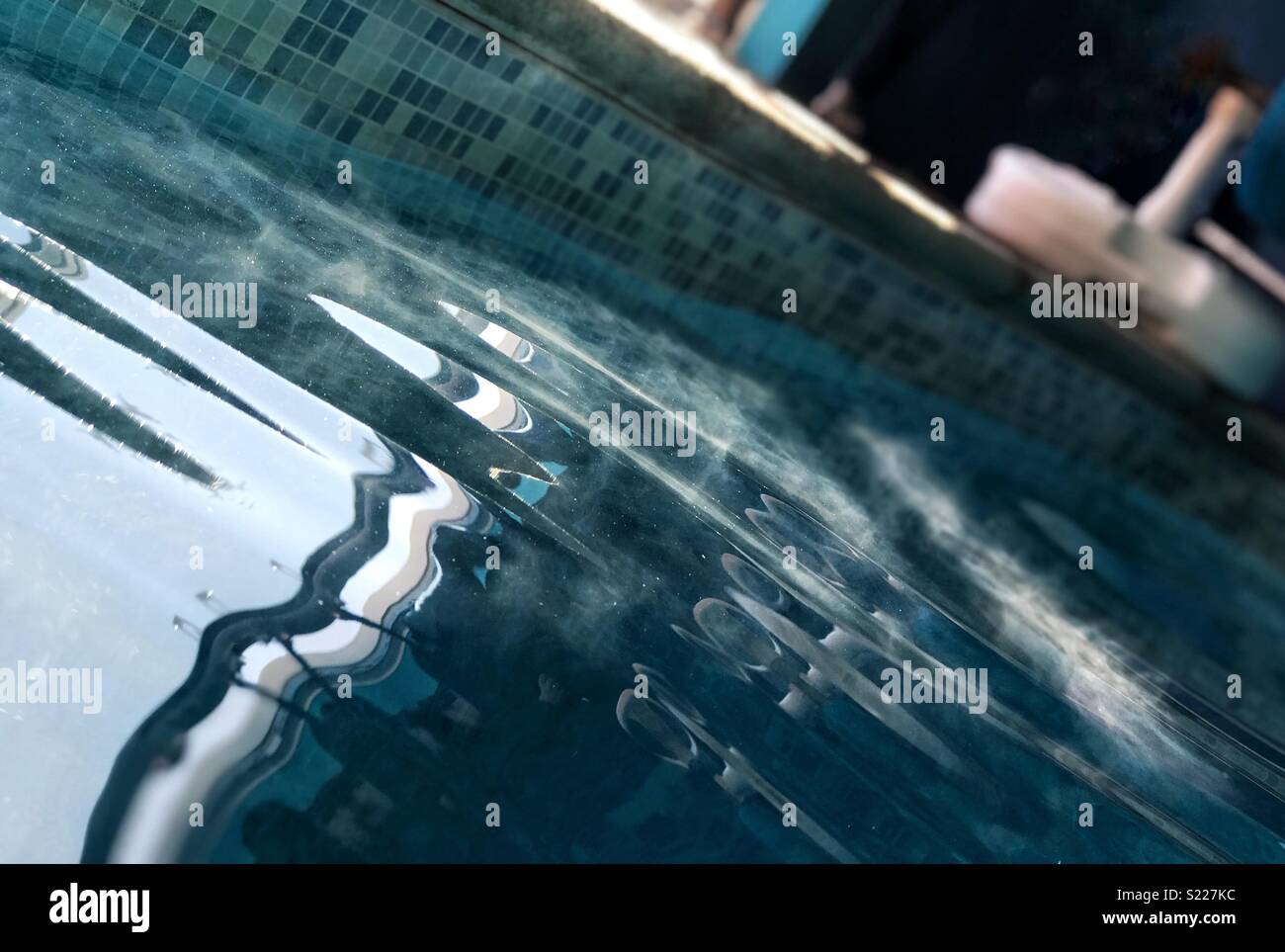 Swimming pool water reflection Stock Photo - Alamy