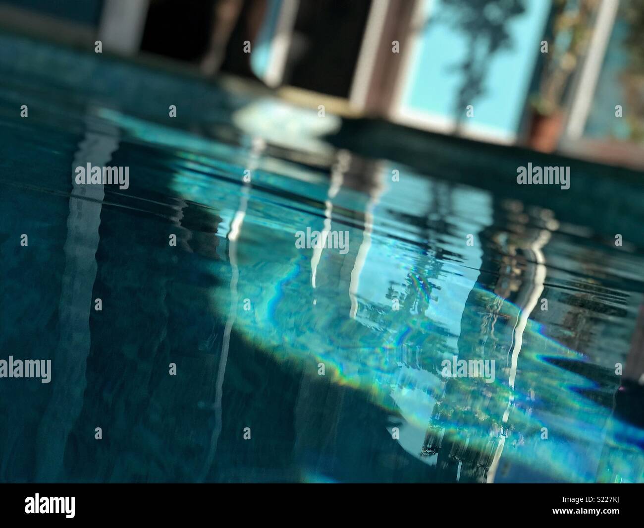 Blue water reflection Stock Photo - Alamy