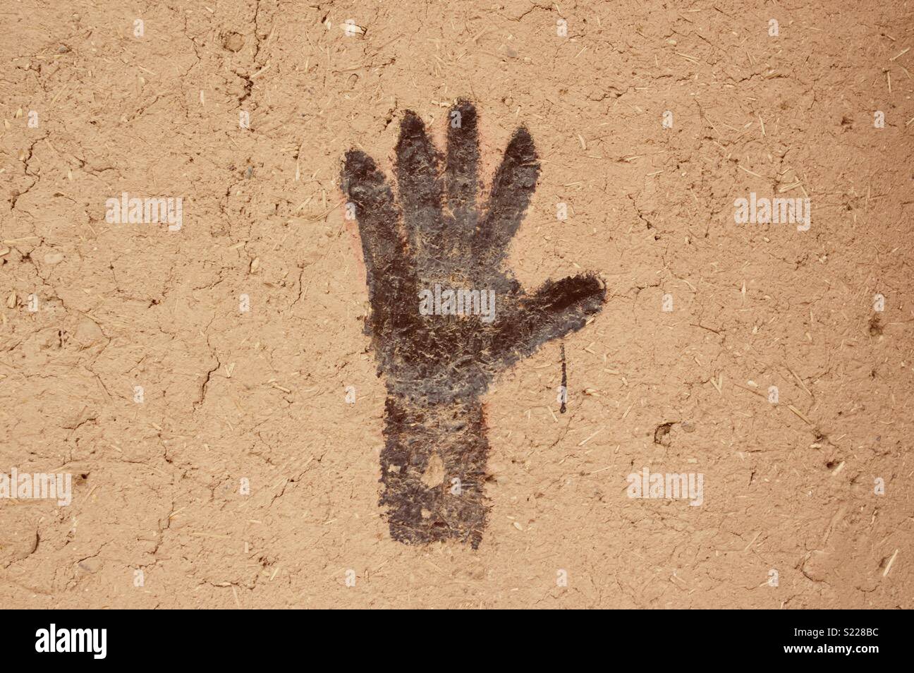 Handprint on a wall Stock Photo - Alamy