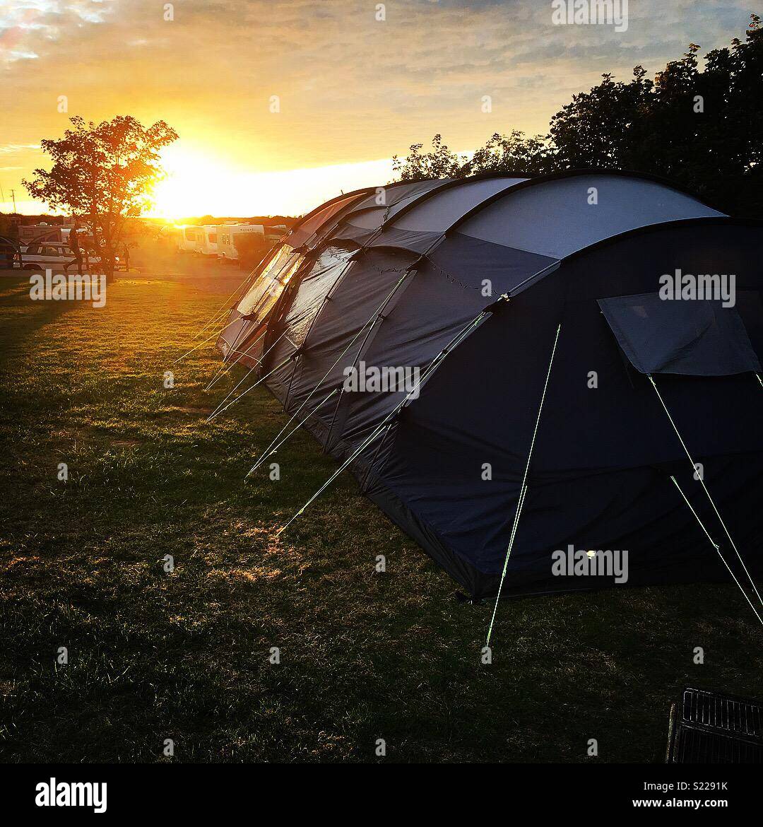 Tent at sunset Stock Photo - Alamy
