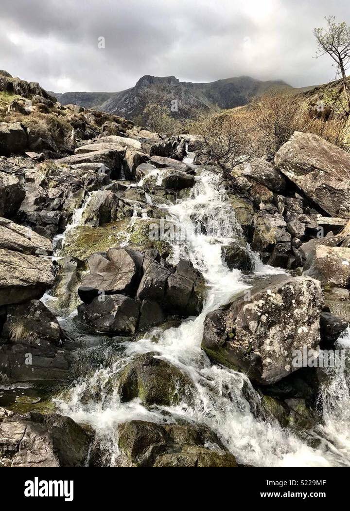 Water crashing on rocks Stock Photo - Alamy