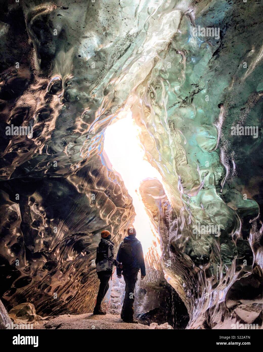 Exploring Ice caves Stock Photo - Alamy