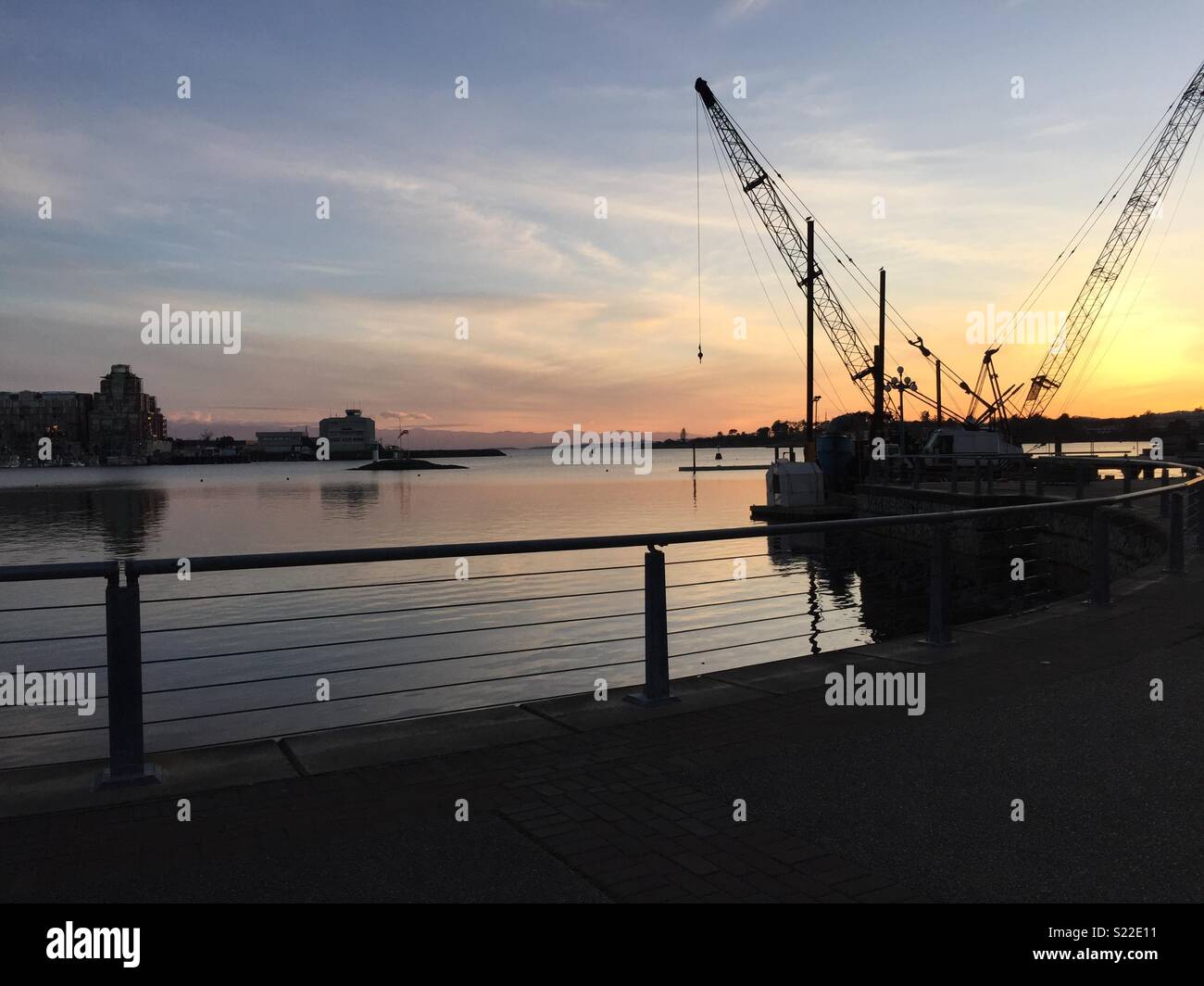 Sunset on victoria harbour Stock Photo - Alamy