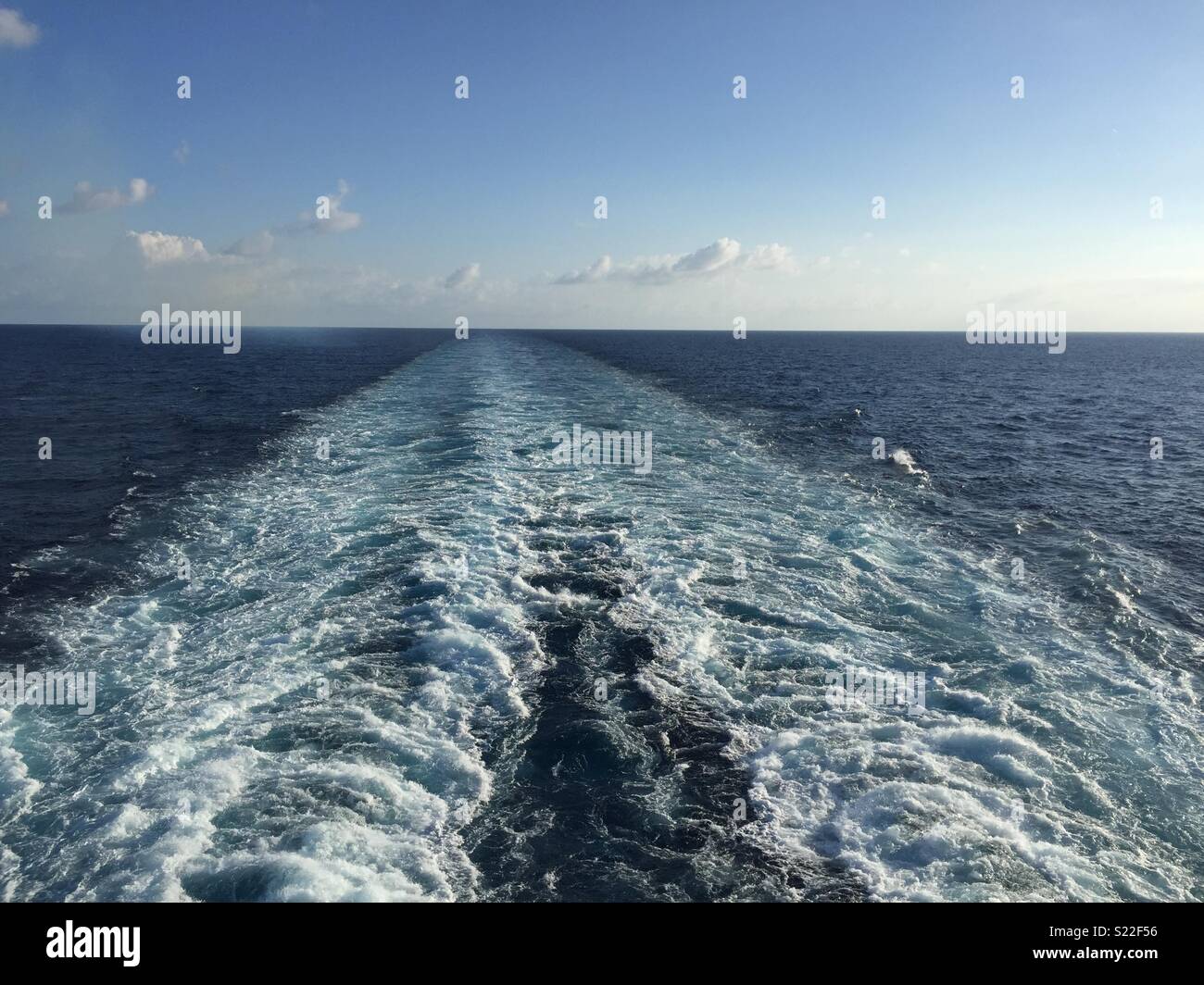 The wake of a cruise ship in the ocean Stock Photo - Alamy