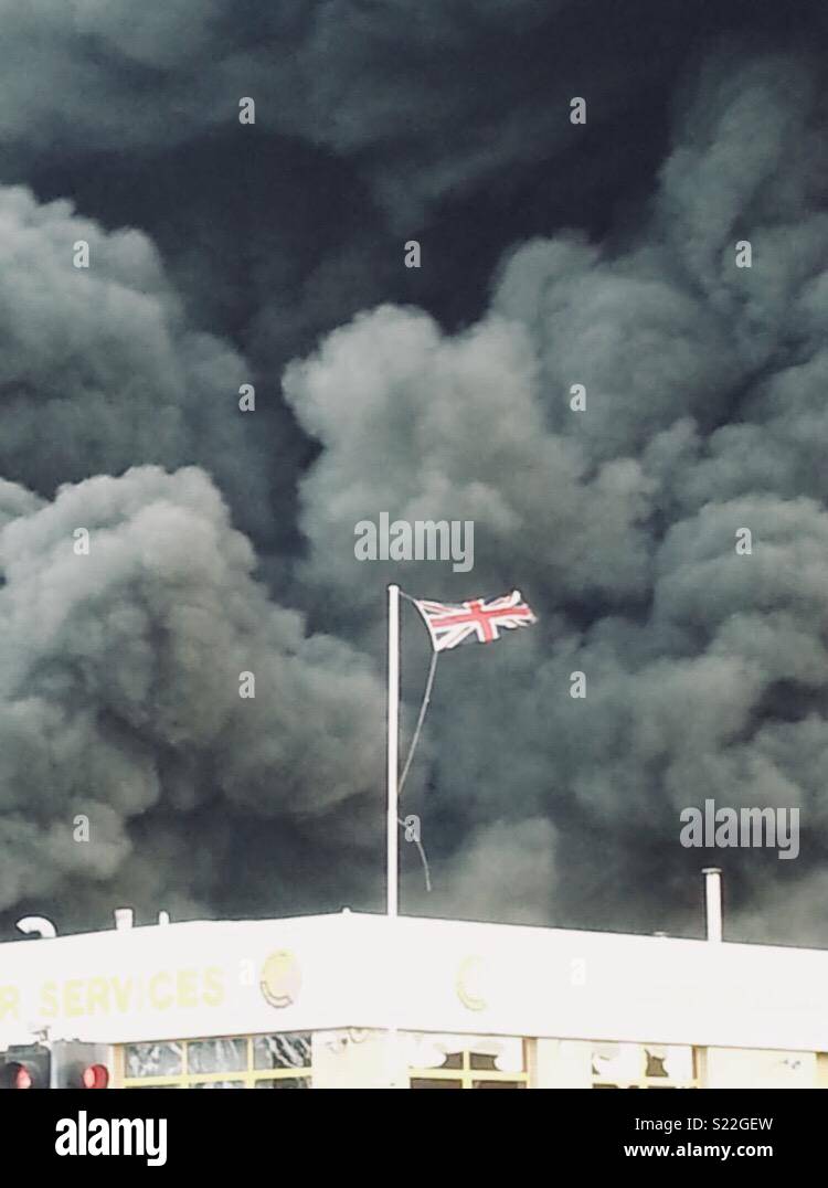 The union flag standing up to an inferno Stock Photo - Alamy